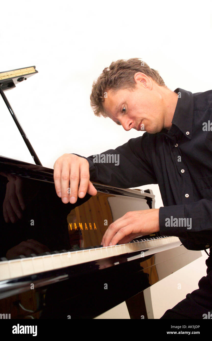 Man playing piano Stock Photo - Alamy
