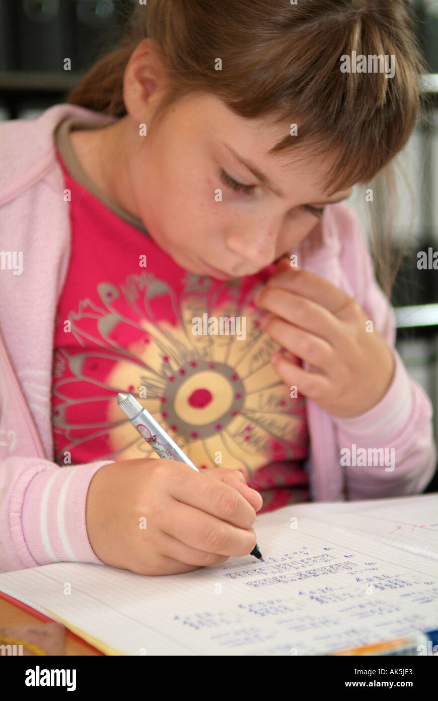 Child makes homework hi-res stock photography and images - Alamy
