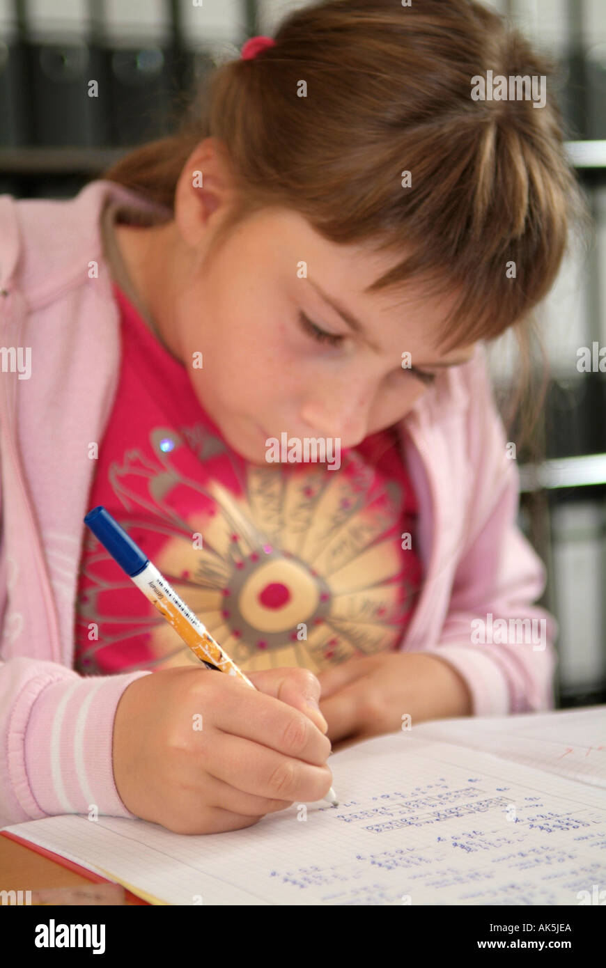child makes homework Stock Photo - Alamy