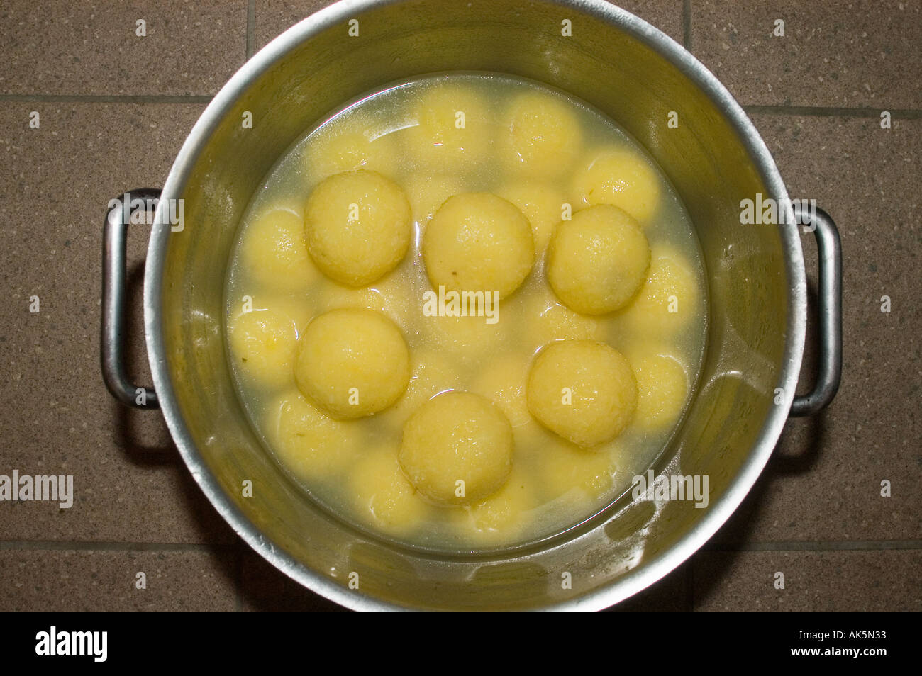 potatoe dumplings in a cooking pot Stock Photo - Alamy