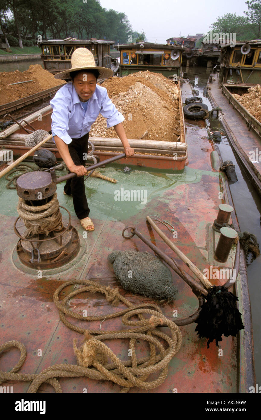 Asia, China, Suzhou. Barge man on Grand Canal Stock Photo - Alamy