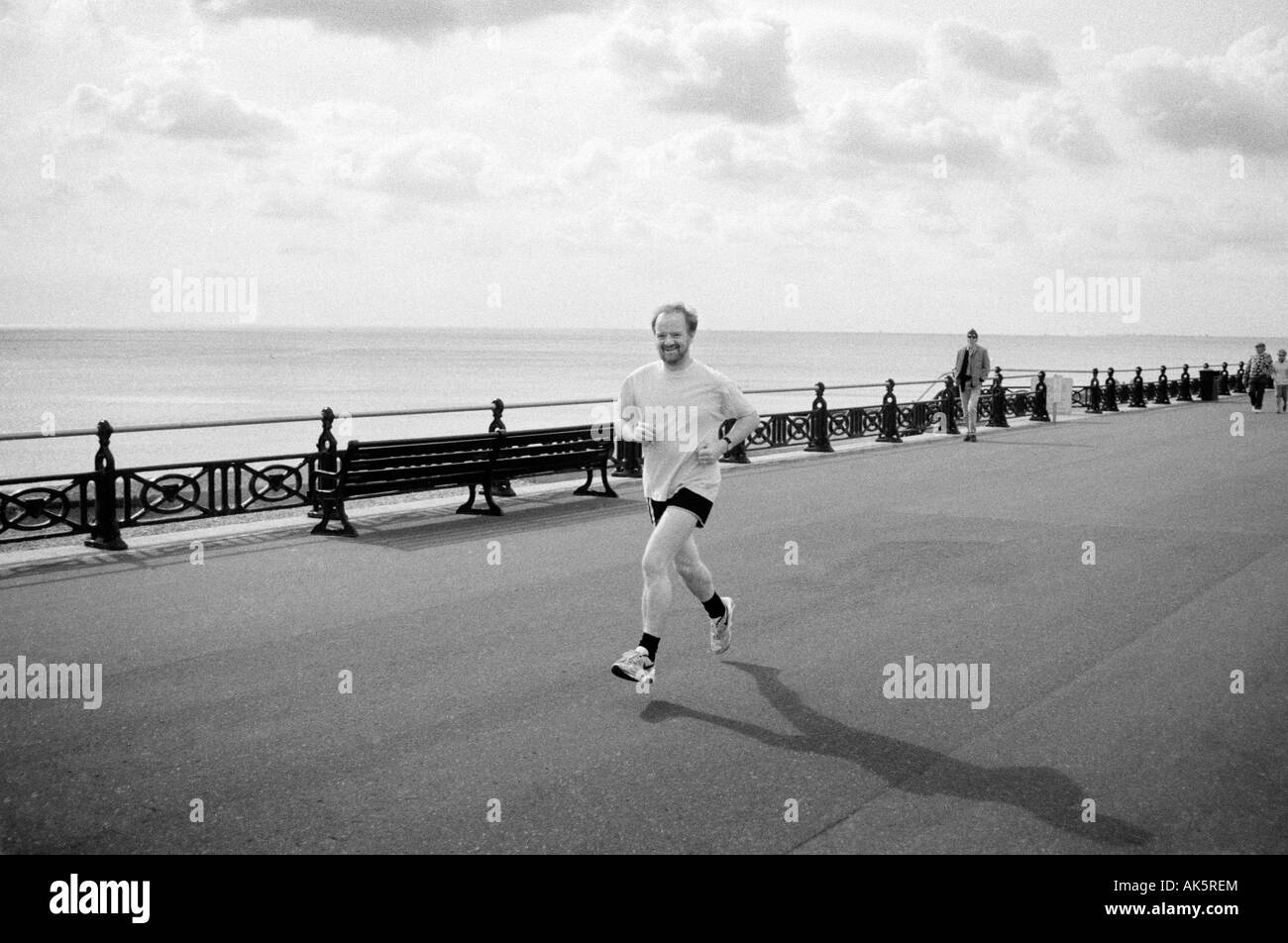 Robin Cook, politician MP running along the Brighton seafront at the ...