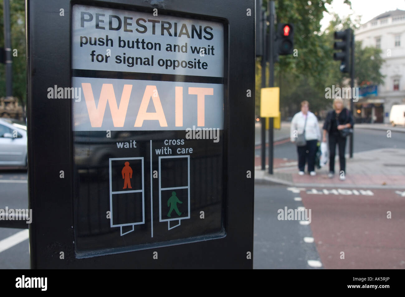 Pedestrian road crossing with wait sign London Stock Photo - Alamy