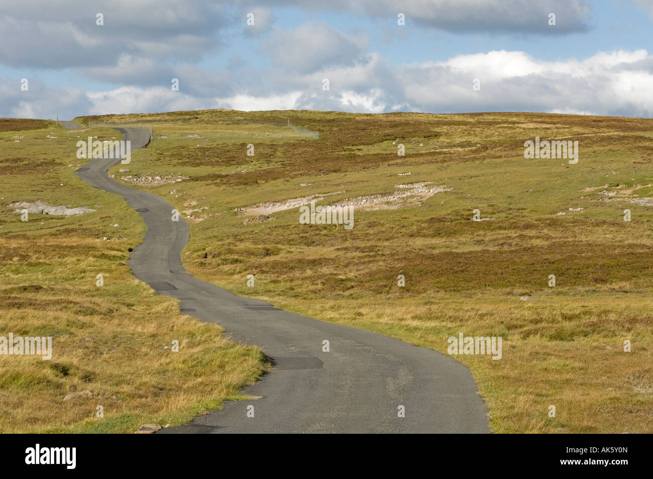 Remote road winding through barren countryside in Upper Teesdale in the ...