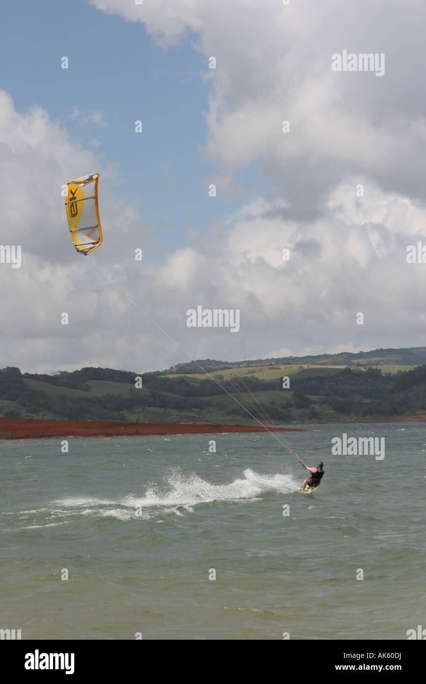 Kite boarding in Costa Rica lake Arenal Stock Photo - Alamy