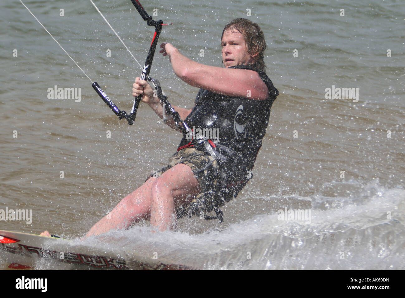kite boarding in costa rica lake arenal Stock Photo - Alamy