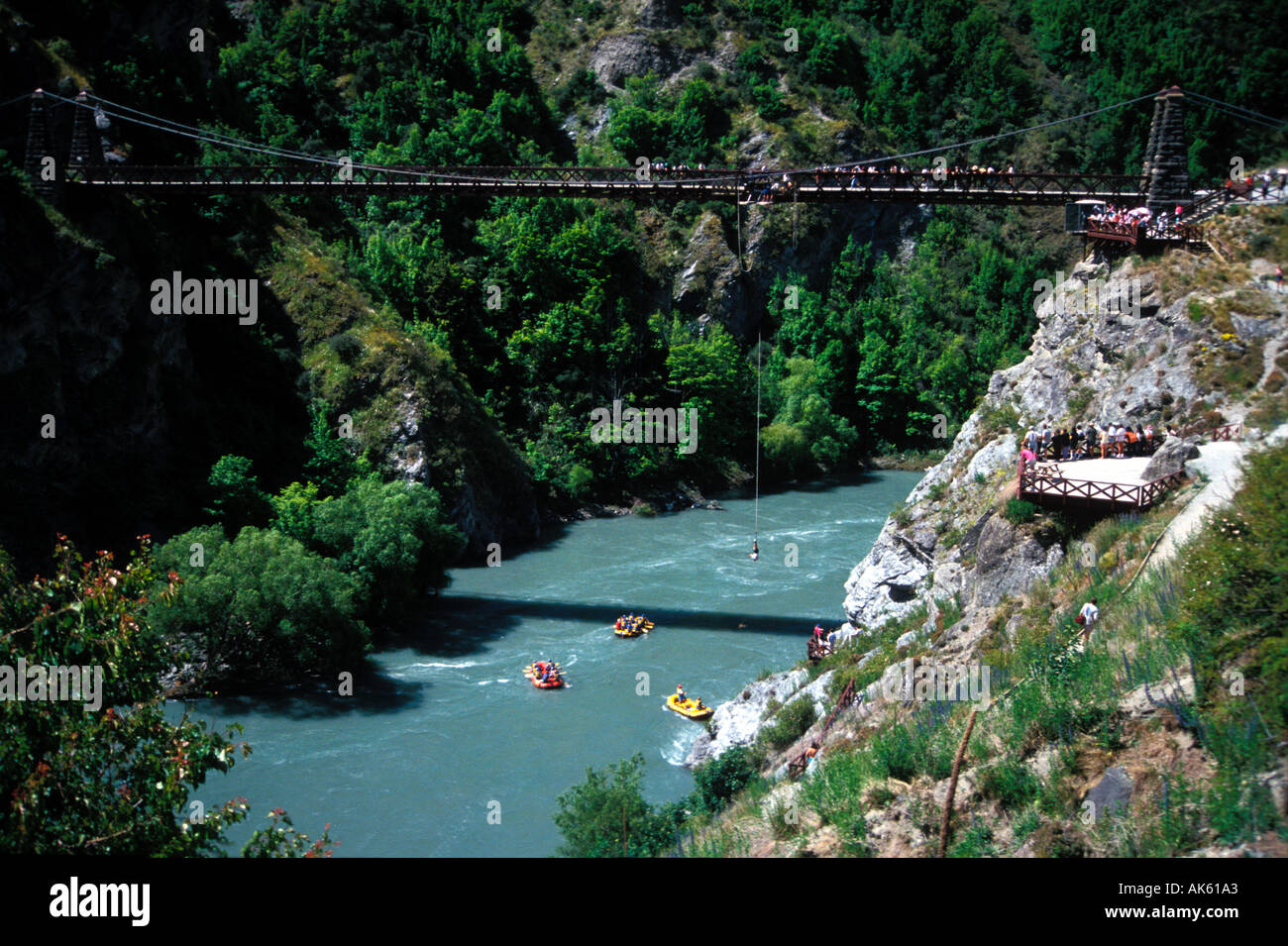 Bungee jumping from a bridge above a river Stock Photo - Alamy