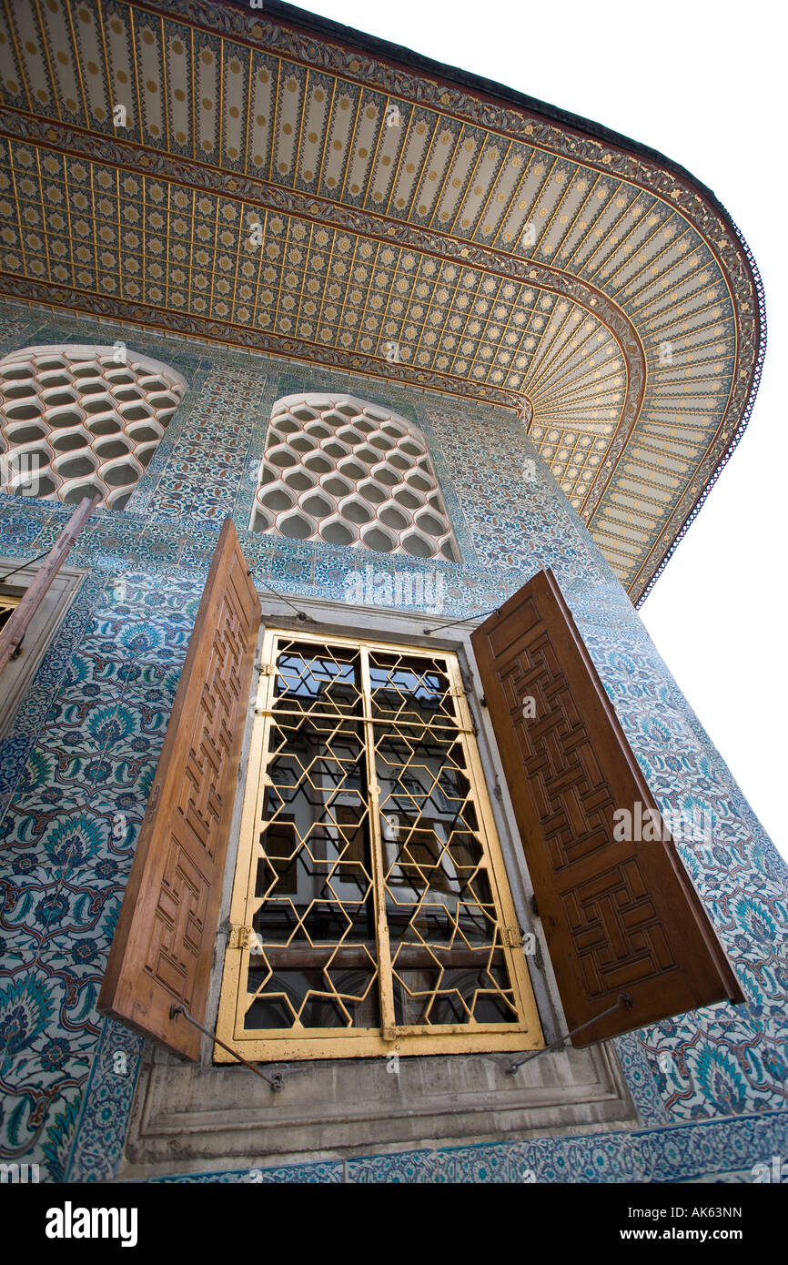 Shutters Open Ceramic Wall: The wooden shutters open to a window in the ...