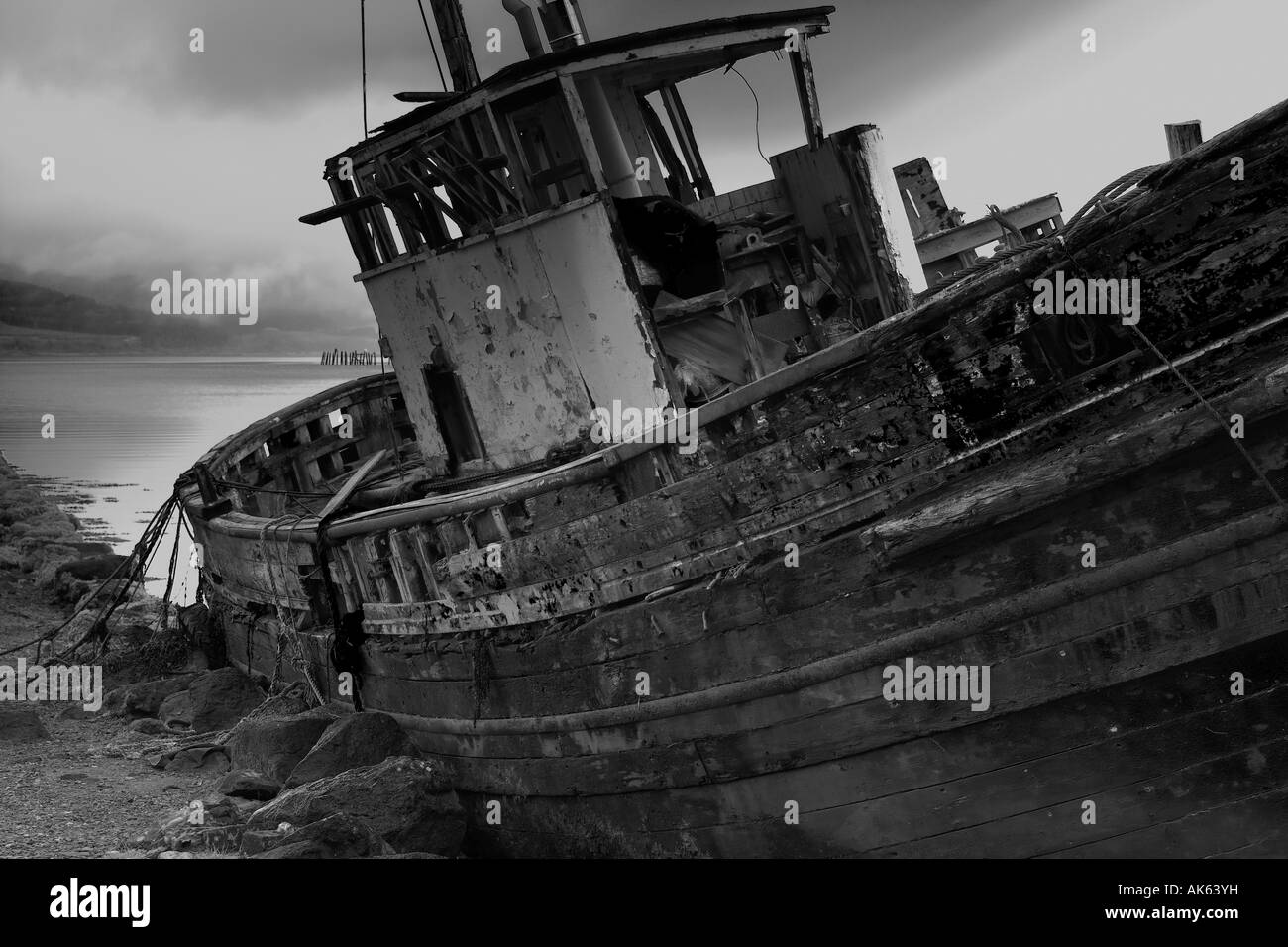 Fishing boats rotting on beach Isle of Mull Stock Photo - Alamy