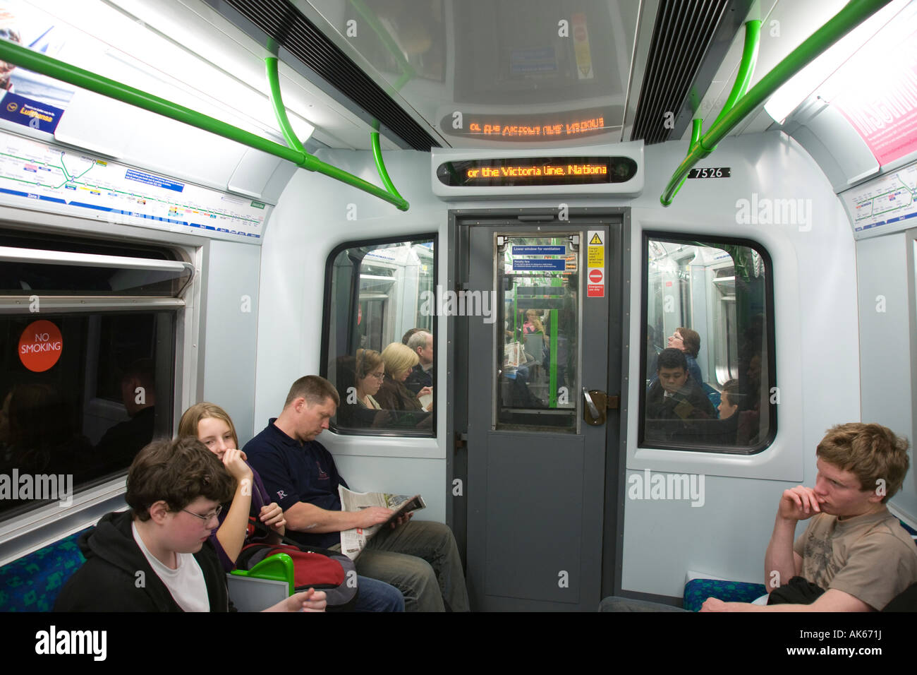 London Underground train carriage interior with passengers Stock Photo ...