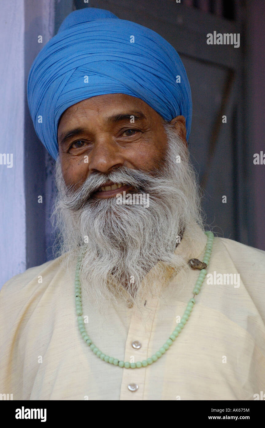 Holy man of Sikh religion. Blue turban within the Sikh religion denotes ...