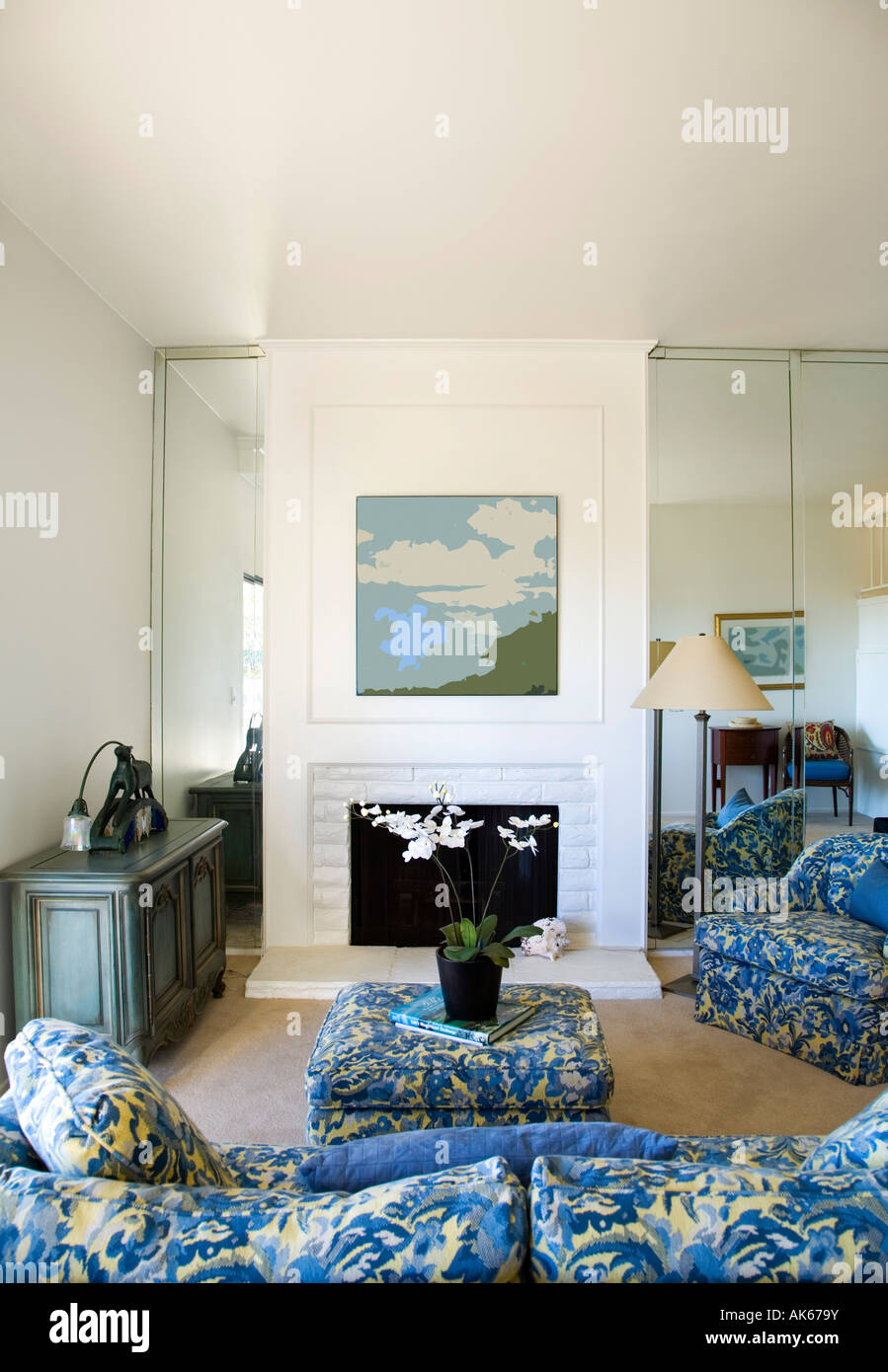 Living Room with Fireplace and Blue Accents Stock Photo - Alamy