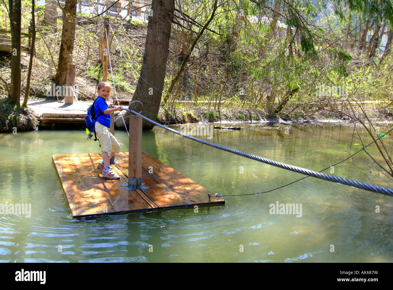 Child on raft Stock Photo - Alamy