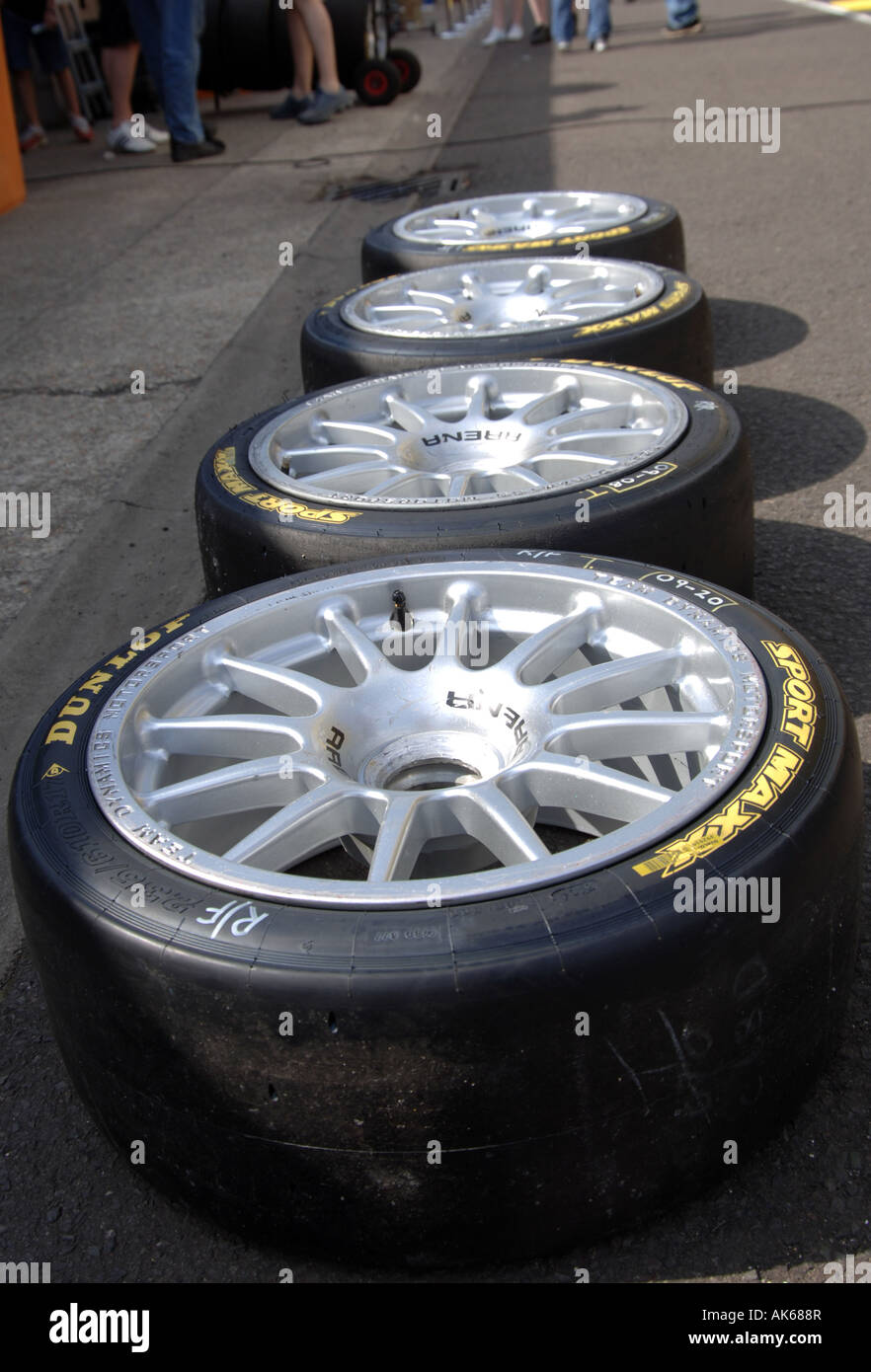 4 Racing car wheels lined up in a row Stock Photo - Alamy