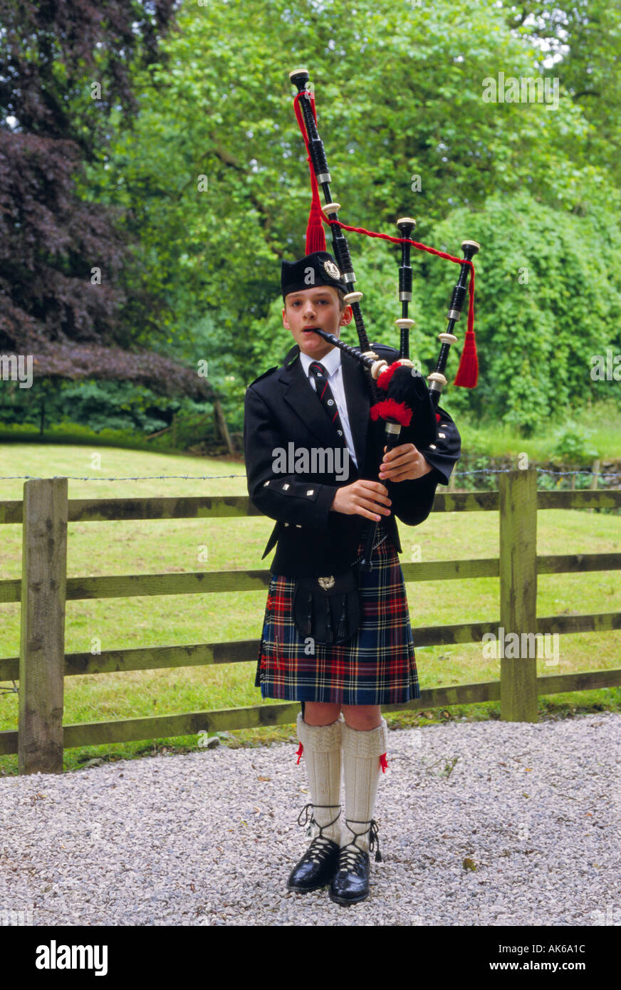 Young scottish bagpiper playing hi-res stock photography and images - Alamy