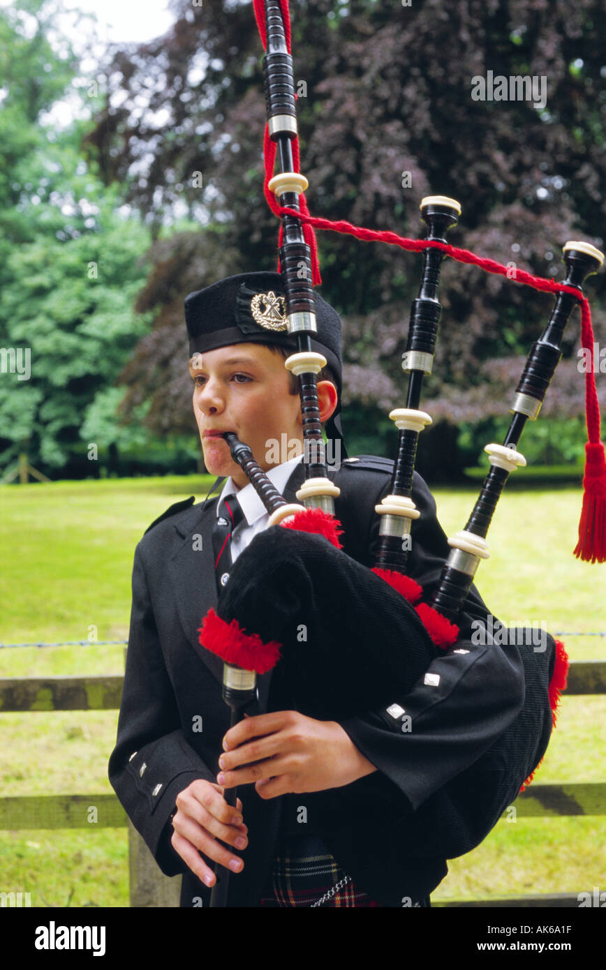Young scottish bagpiper playing hi-res stock photography and images - Alamy