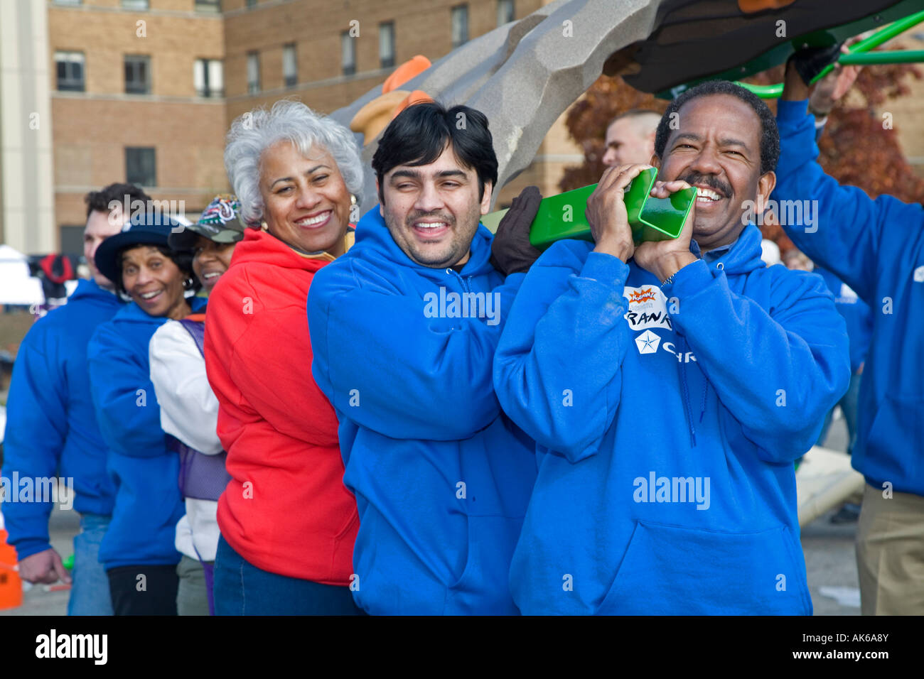 Volunteers Build Playground in Low-Income Community Stock Photo - Alamy