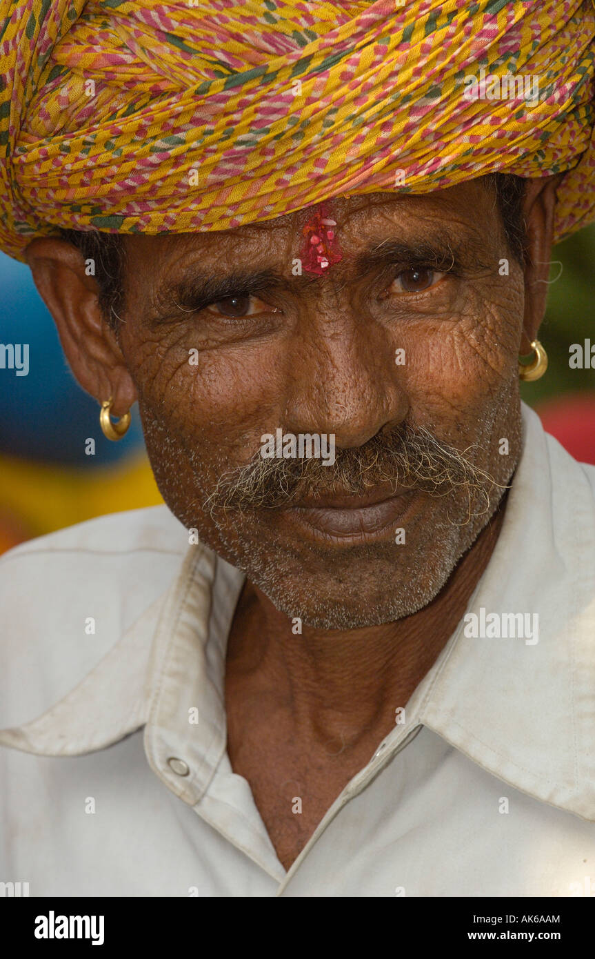 A pilgrim who has come to Pushkar to bath in the sacred lake after the ...