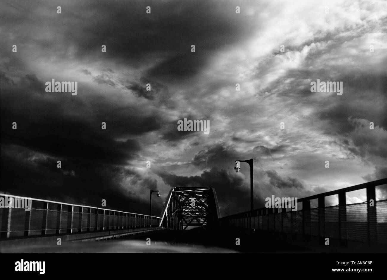 Dark steel bridge beneath ominous Vermont sky Stock Photo - Alamy