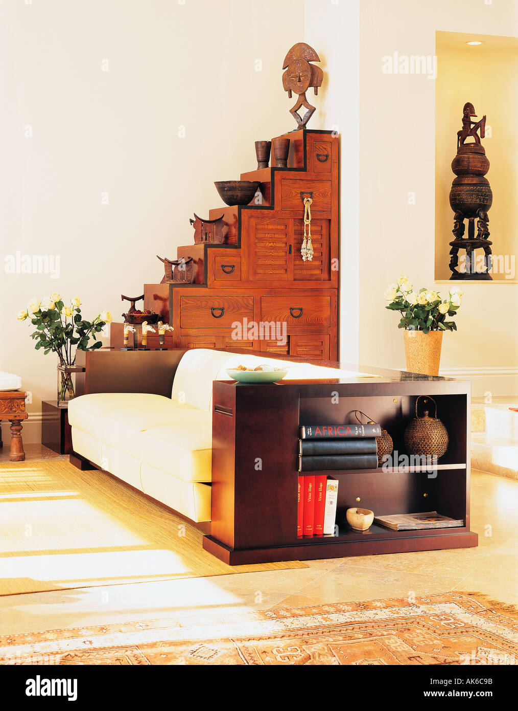 Sun lit living room with exotic furniture Stock Photo - Alamy