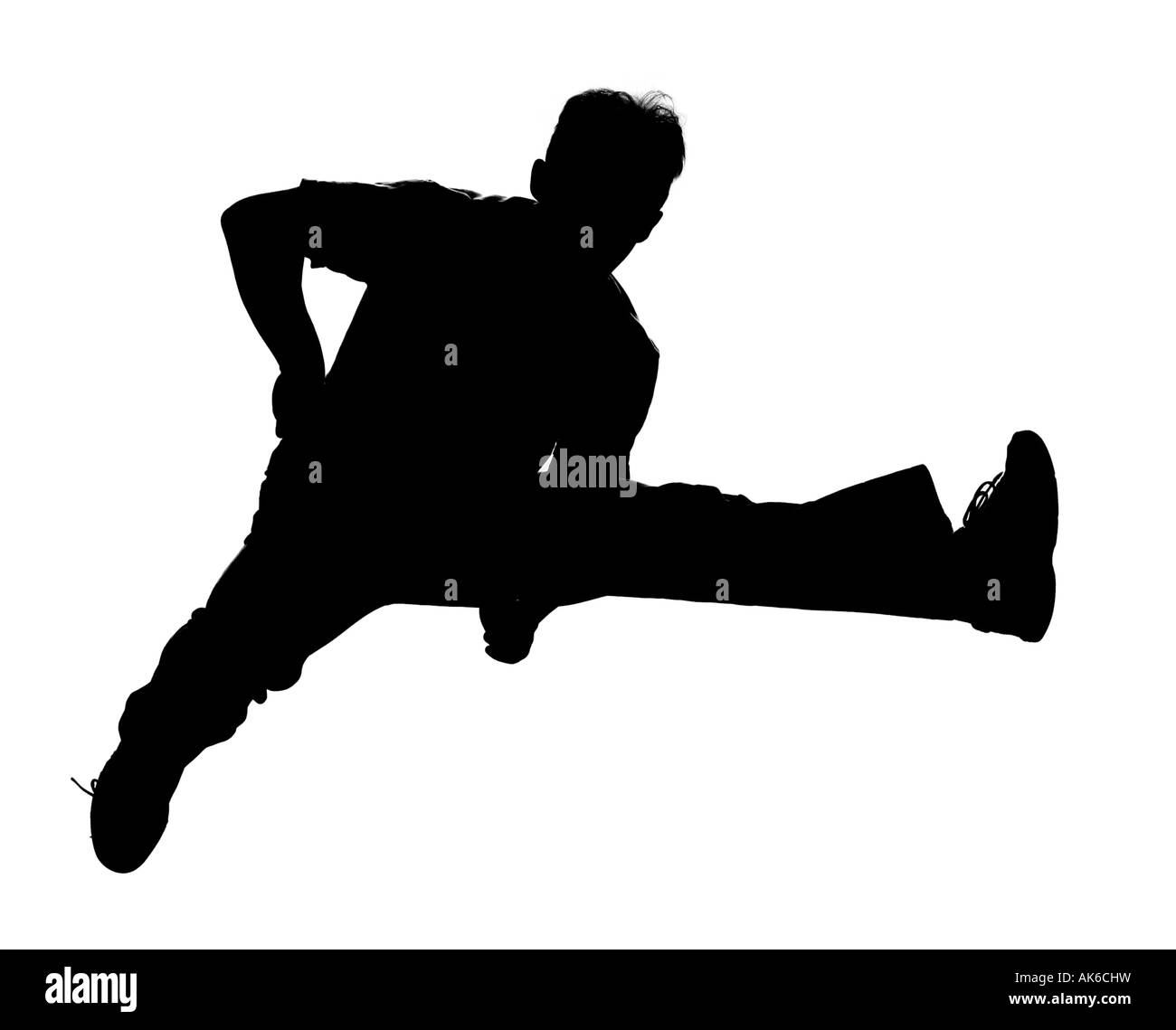 Jumping boy silhouette Stock Photo - Alamy