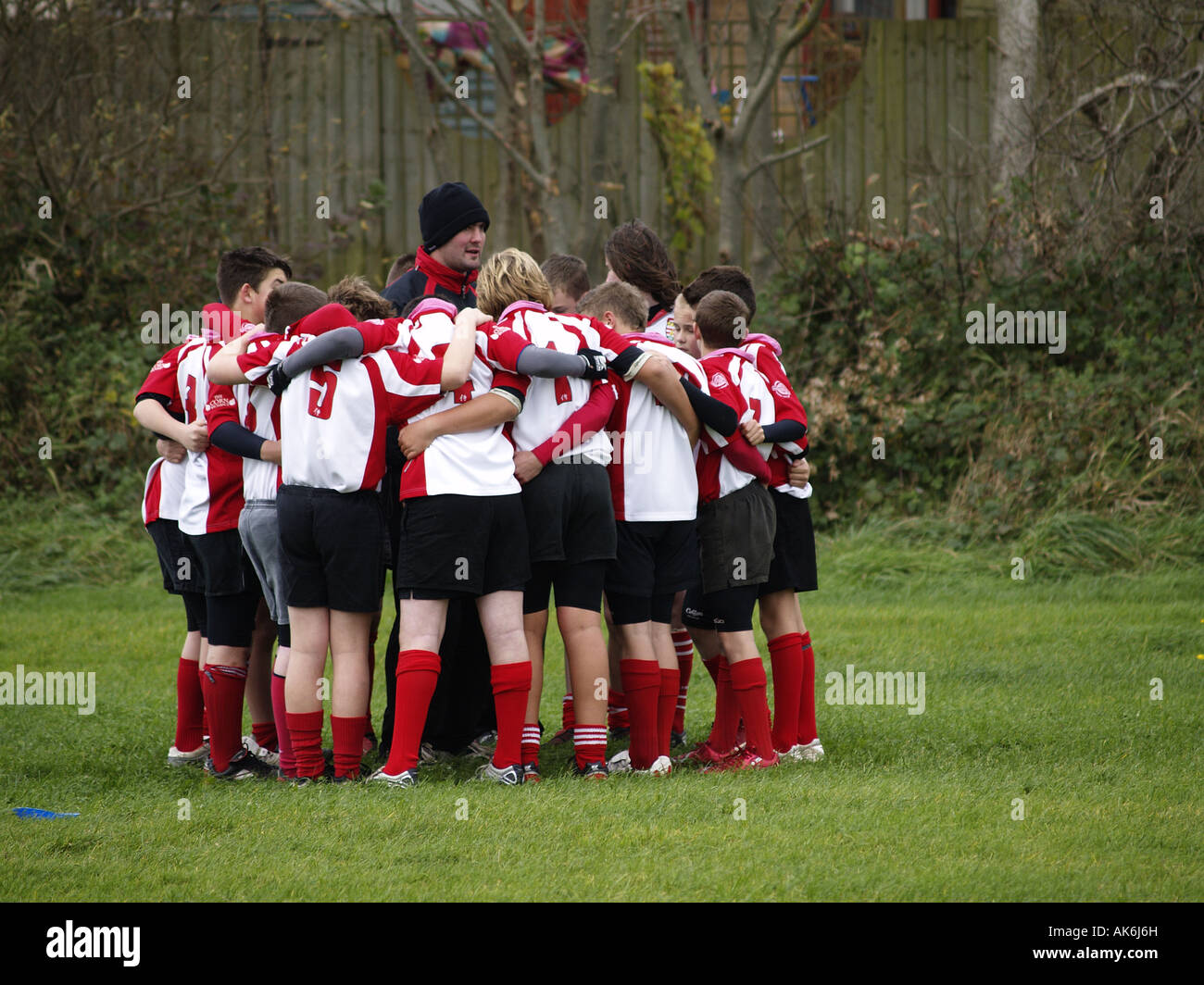 Team huddle before a match Stock Photo - Alamy