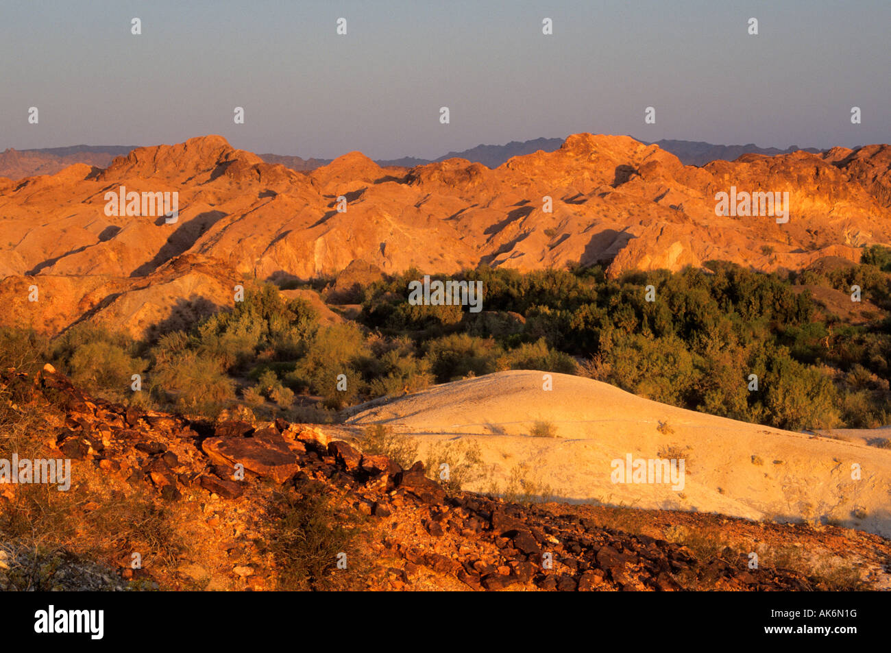 Sunrise colors the eroded hills at Picacho State Recreation Area in the ...