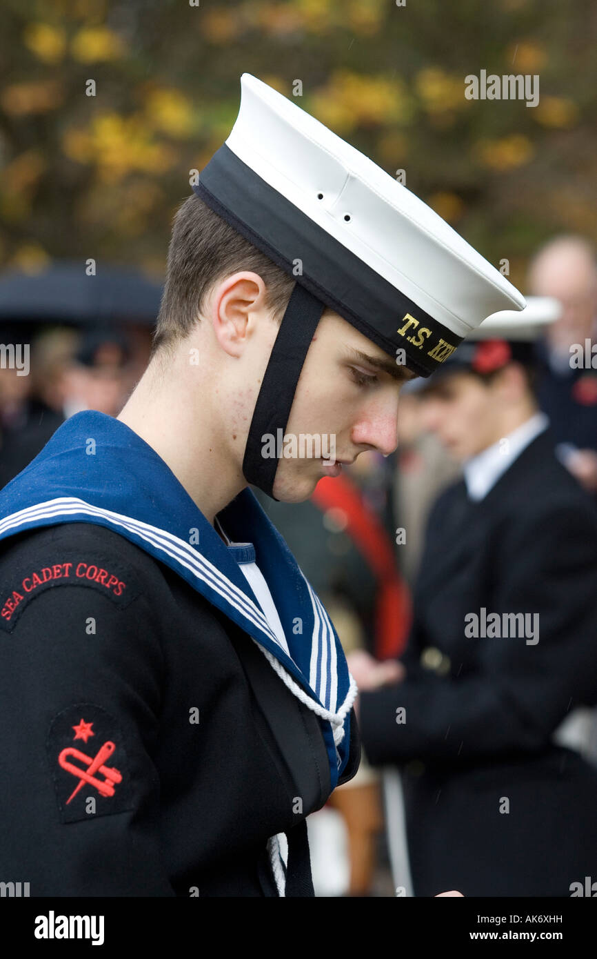 A young sea cadet shows his respect at Remembrance Sunday Service Stock ...