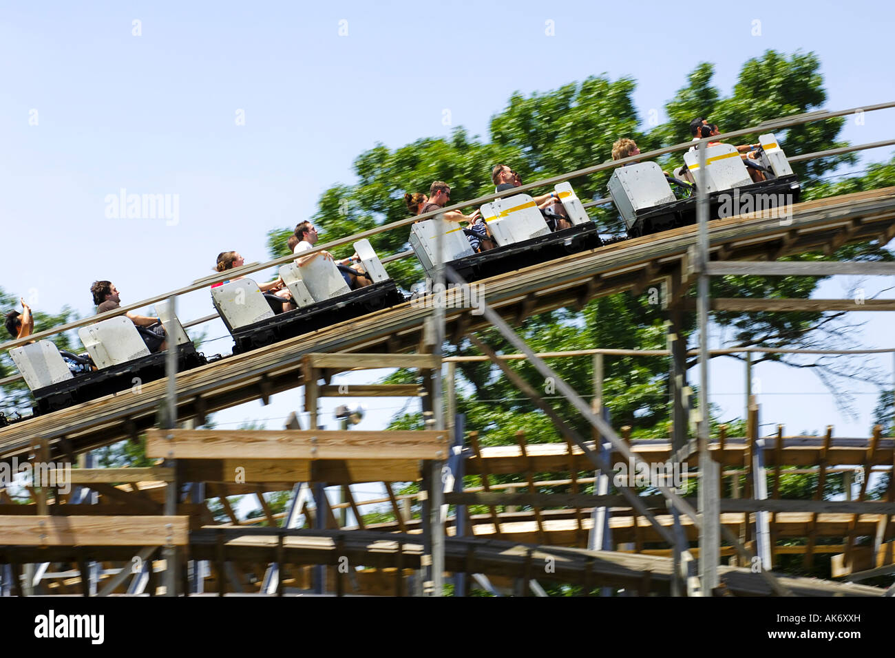 People having fun on a Rollercoaster at one of the Theme Parks in the ...
