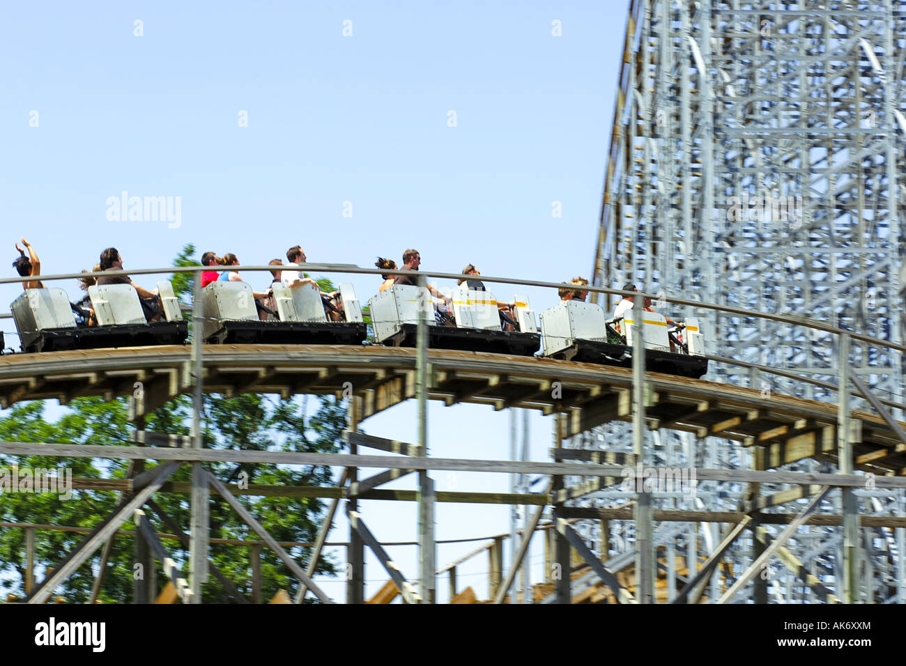 People having fun on a Rollercoaster at one of the Theme Parks in the ...