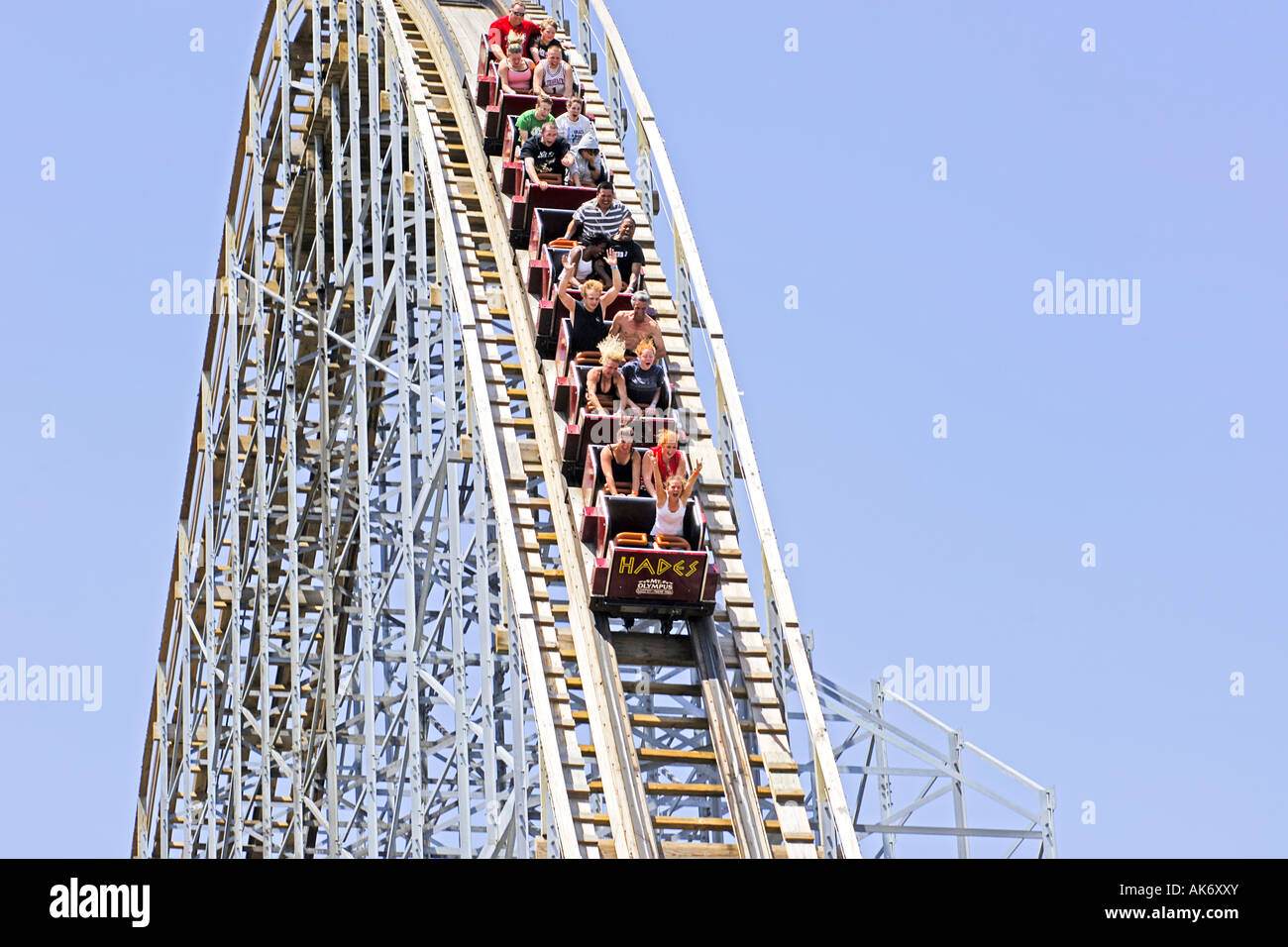 People having fun on a Rollercoaster at one of the Theme Parks in the ...