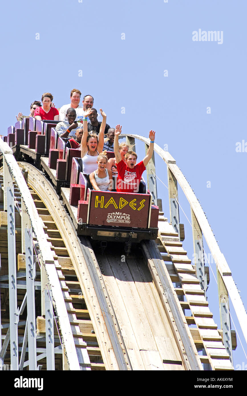 People having fun on a Rollercoaster at one of the Theme Parks in the ...