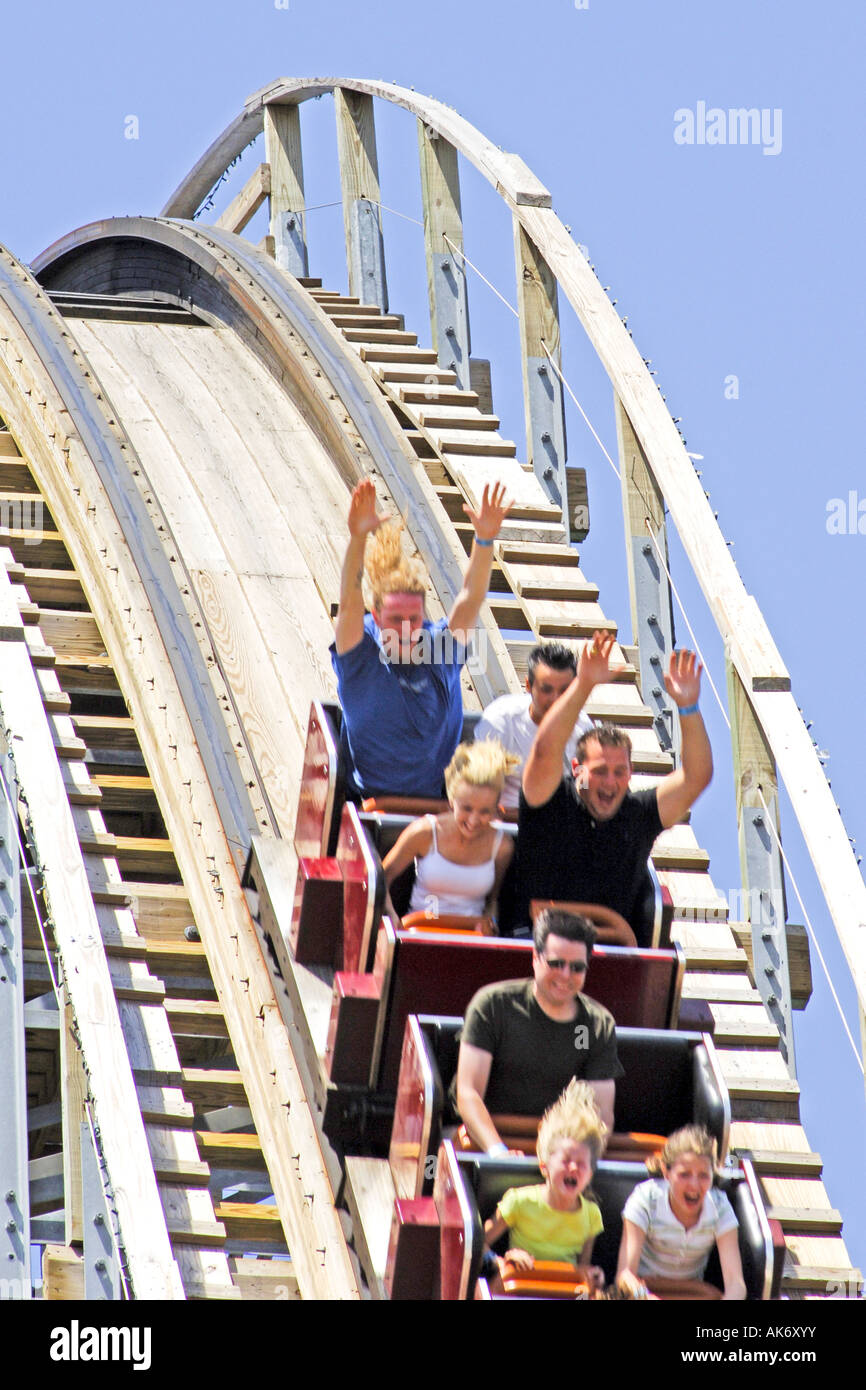People having fun on a Rollercoaster at one of the Theme Parks in the ...