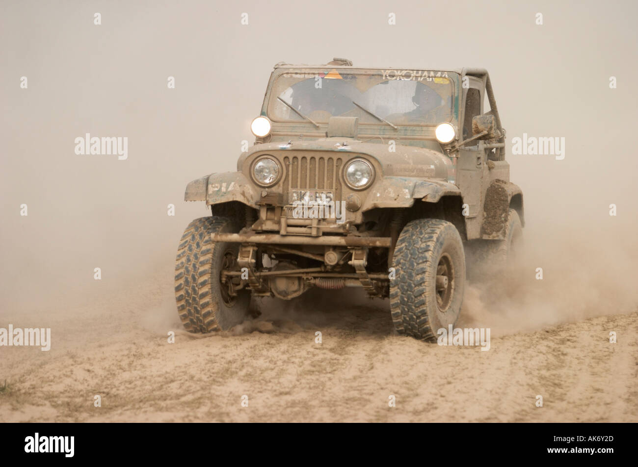 Jeep drives on dusty road on rallye Berlin Breslau Stock Photo - Alamy