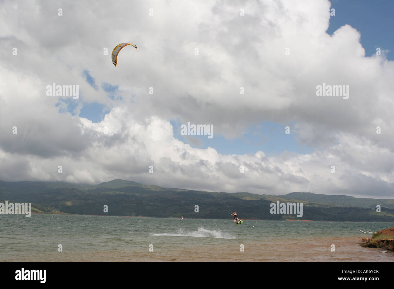 kite boarding in costa rica lake arenal Stock Photo - Alamy
