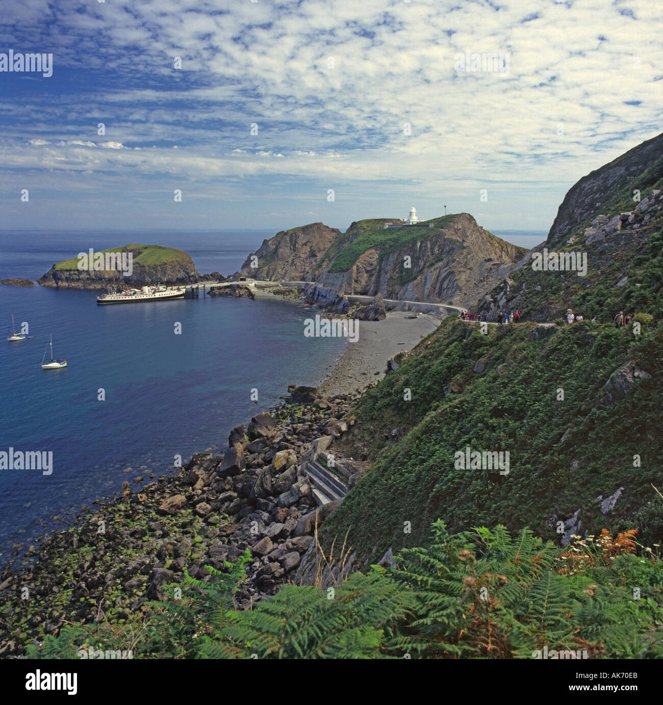 People walking up the main cliff path of Lundy Island from the Balmoral ...