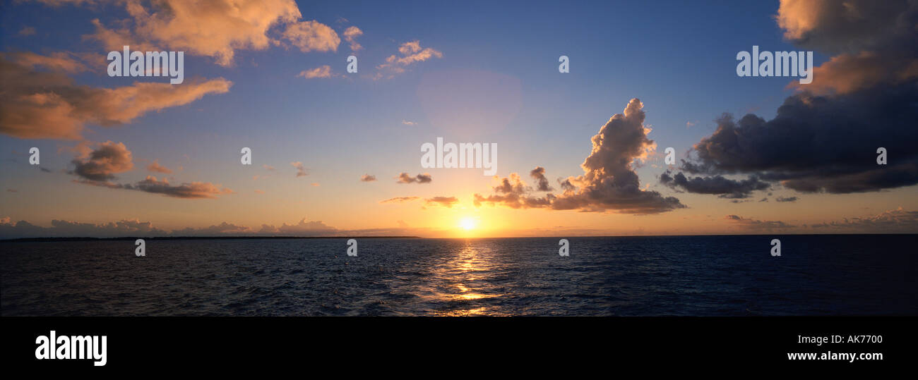 Sunset over ocean Stock Photo - Alamy