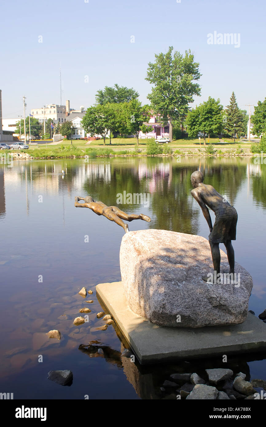 Bronze sculptures on the banks of the Menominee River in Marinette ...