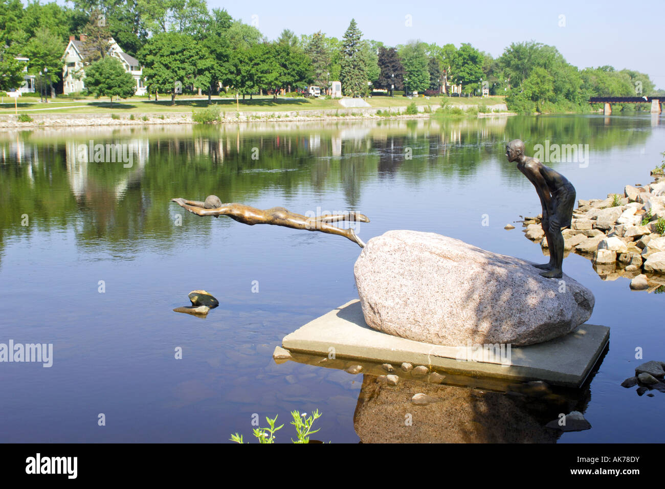 Bronze sculptures on the banks of the Menominee River in Marinette ...