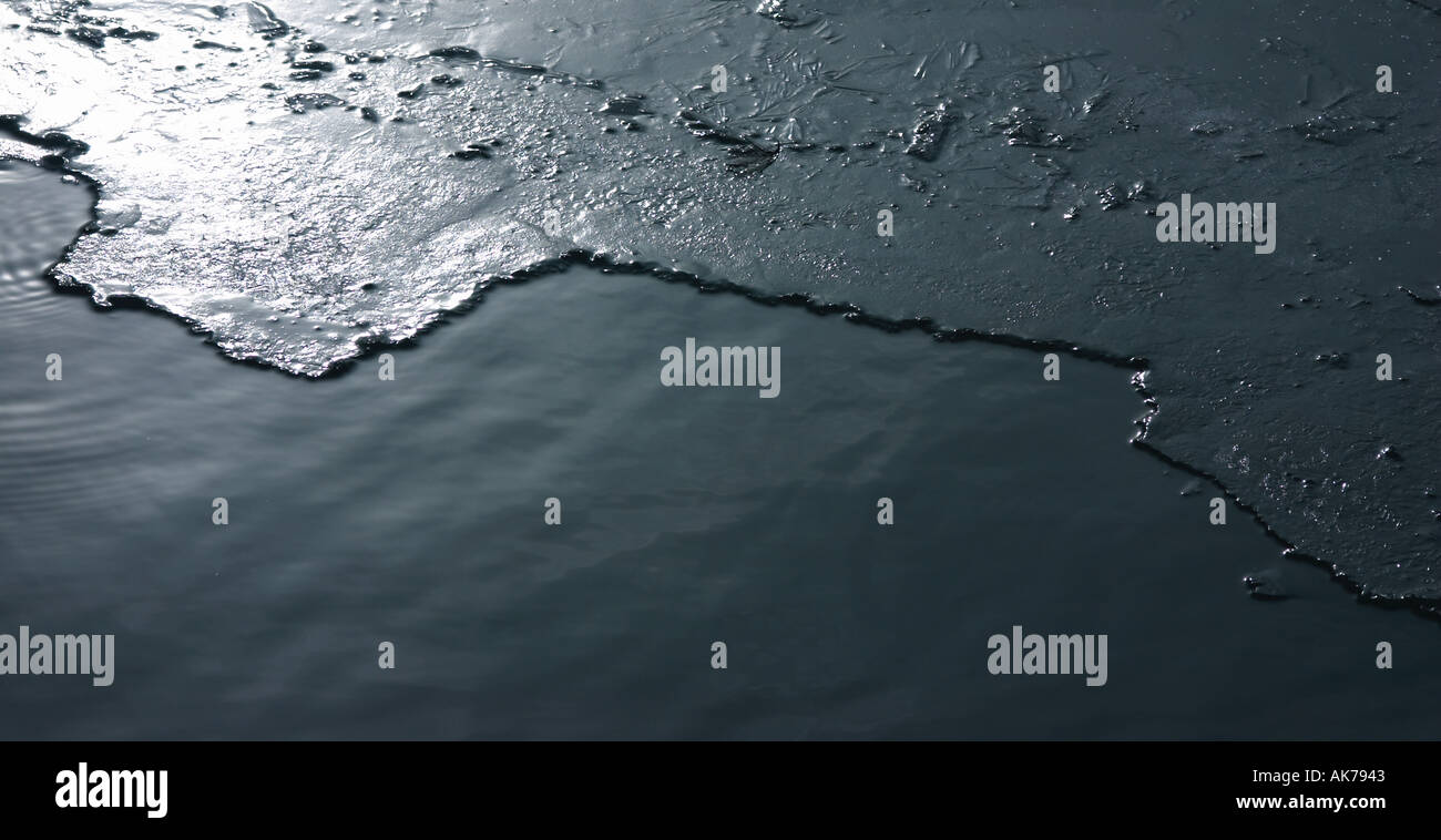 melting ice shrouded in shadow Stock Photo - Alamy