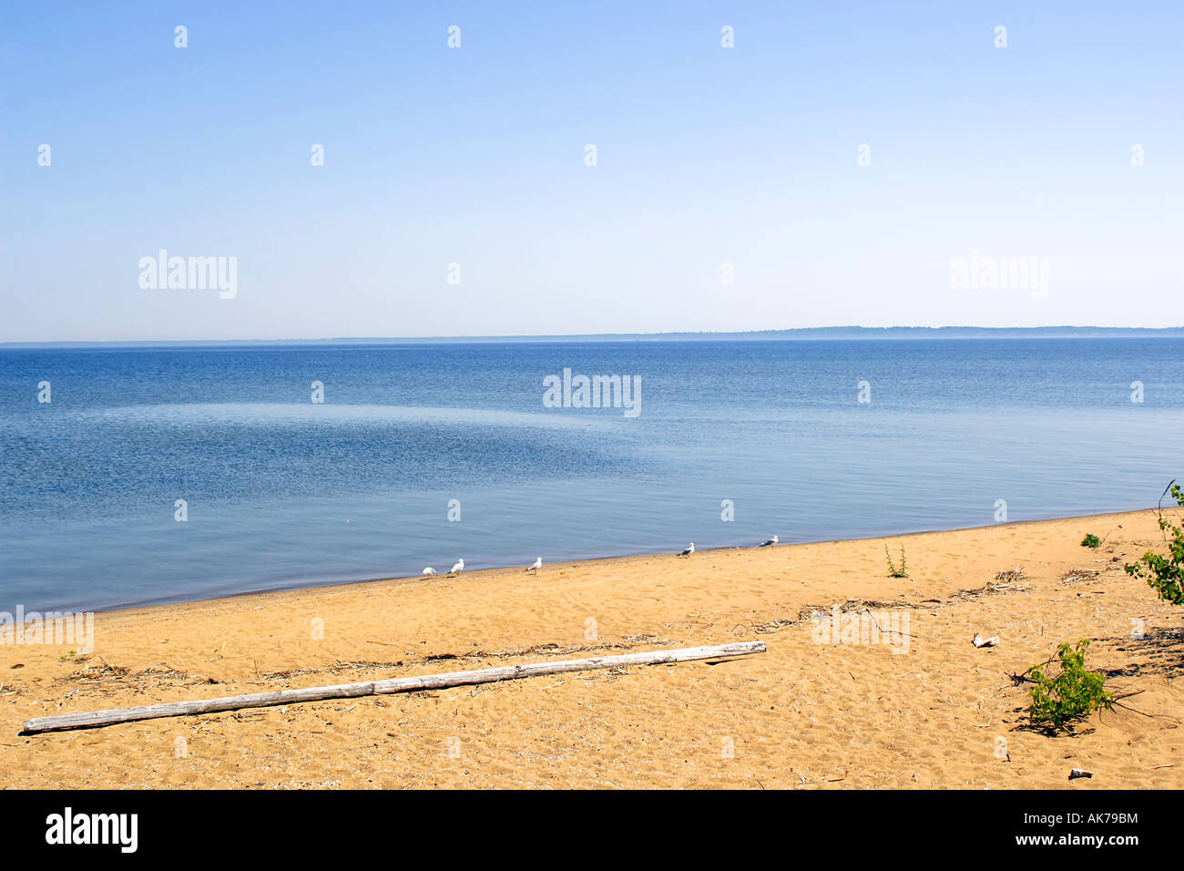 The blue water of Lake Michigan in the Upper Penninsula of Michigan and ...