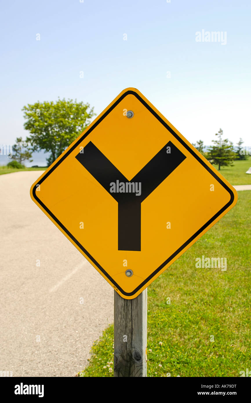 Y Road sign black Y on a yellow background Stock Photo - Alamy