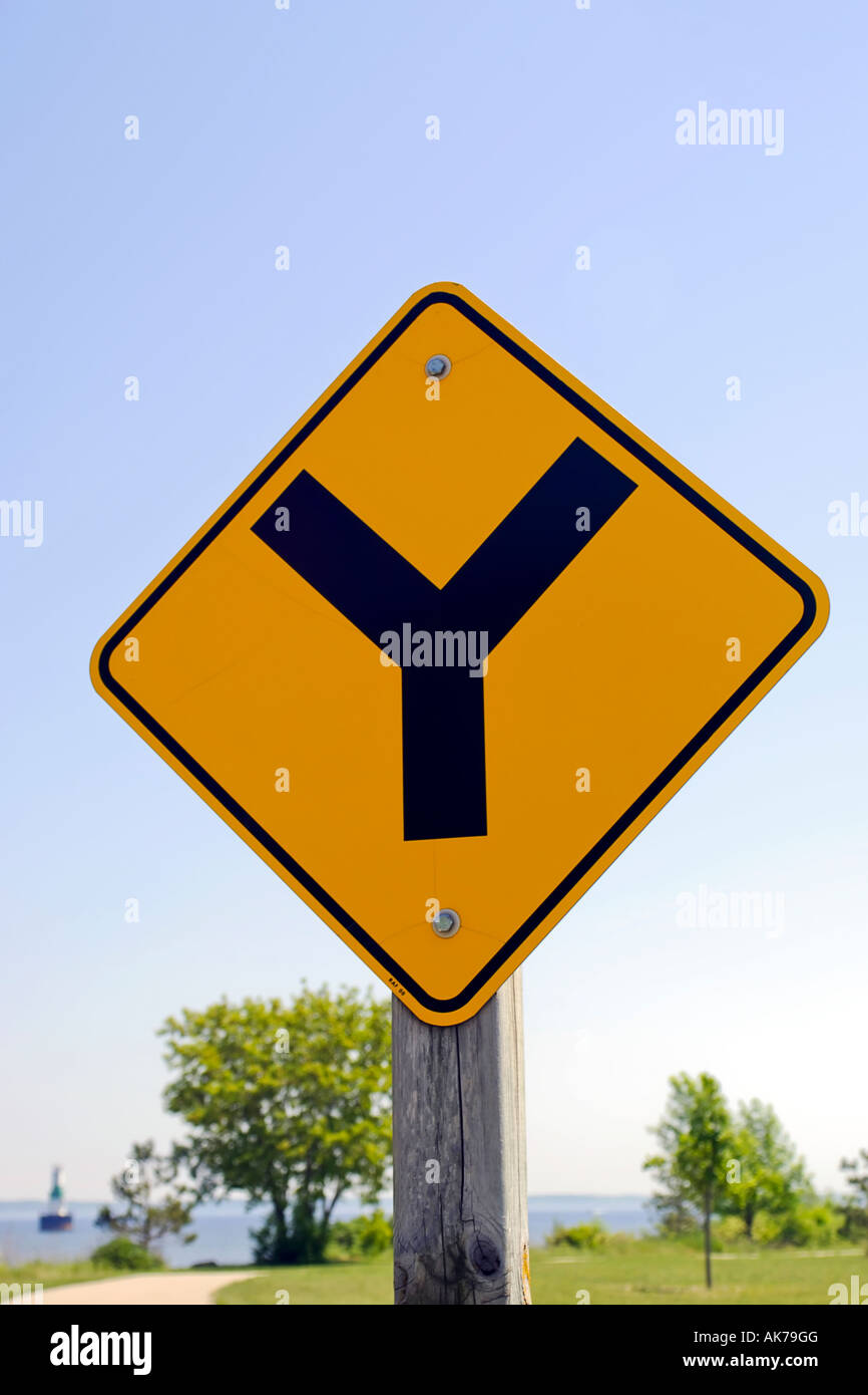 Y Road sign black Y on a yellow background Stock Photo - Alamy