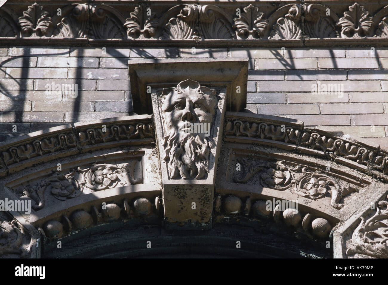 Yellow Brick Brownstone gargoyle decoration Chinatown New York Stock ...