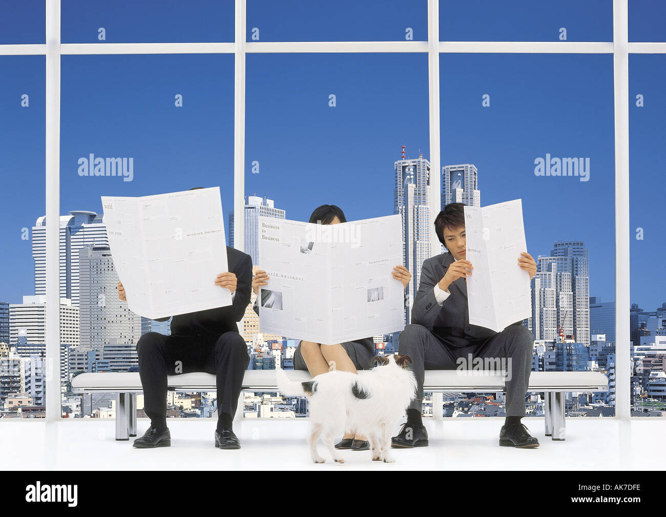 Business people reading newspaper Stock Photo - Alamy