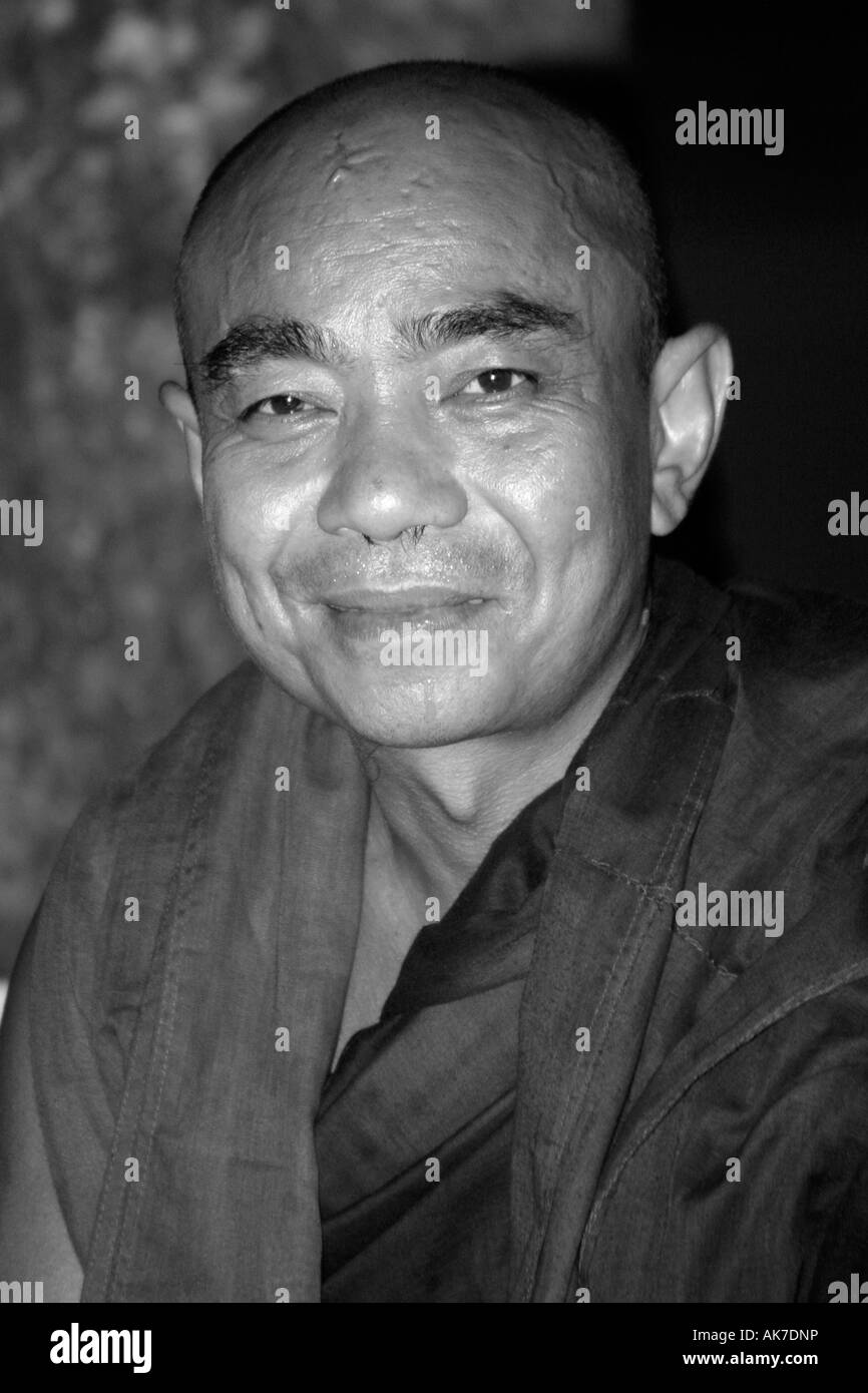 Buddhist monk at night at the Golden Rock at Kyaiktiyo, Lower Burma ...