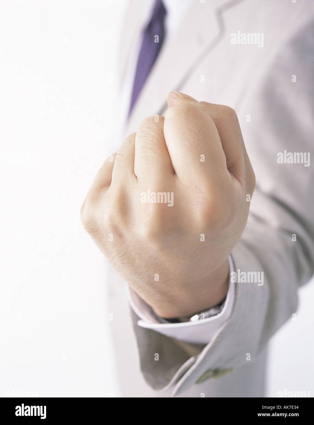 Hand of businessman victory pose Stock Photo - Alamy