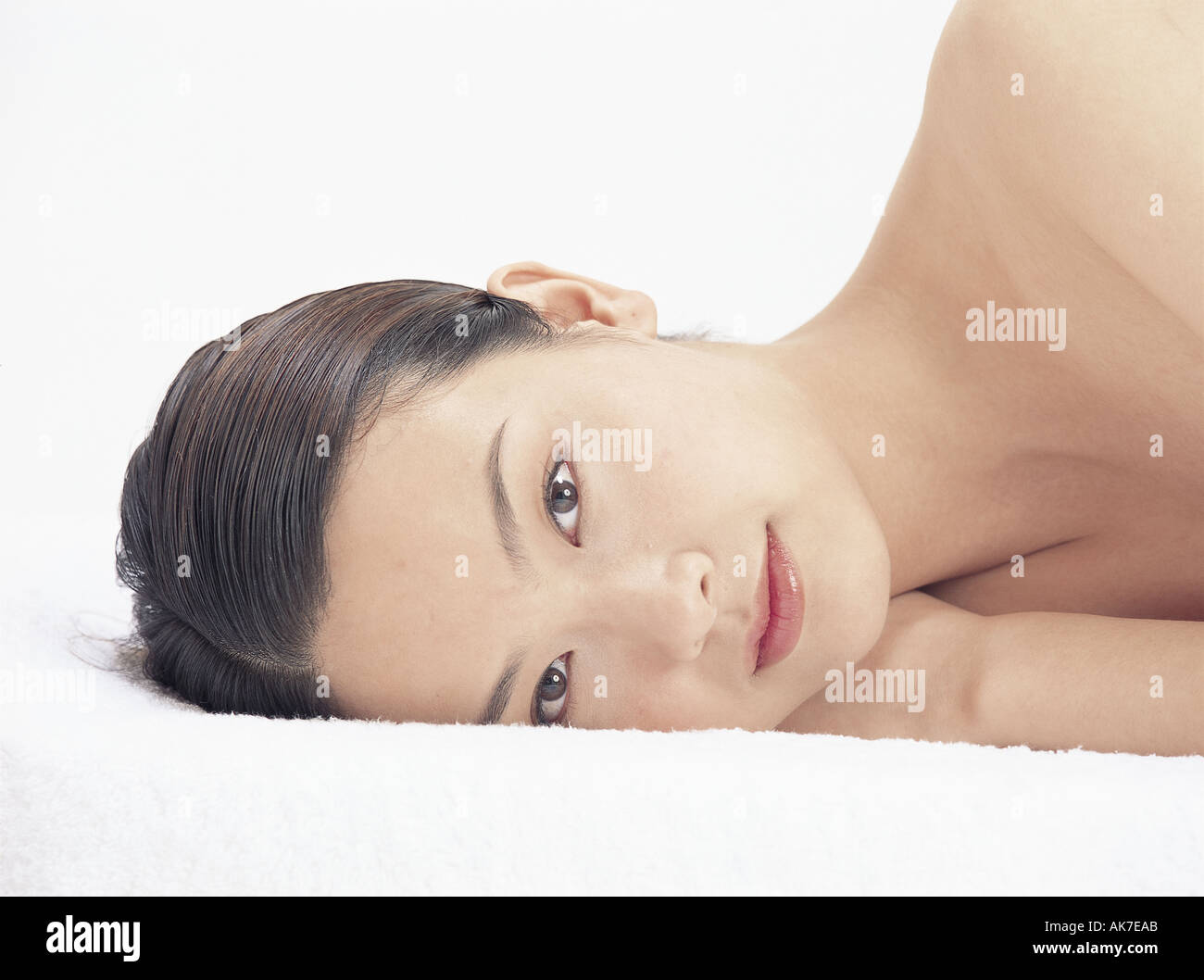 Woman laying down Stock Photo - Alamy