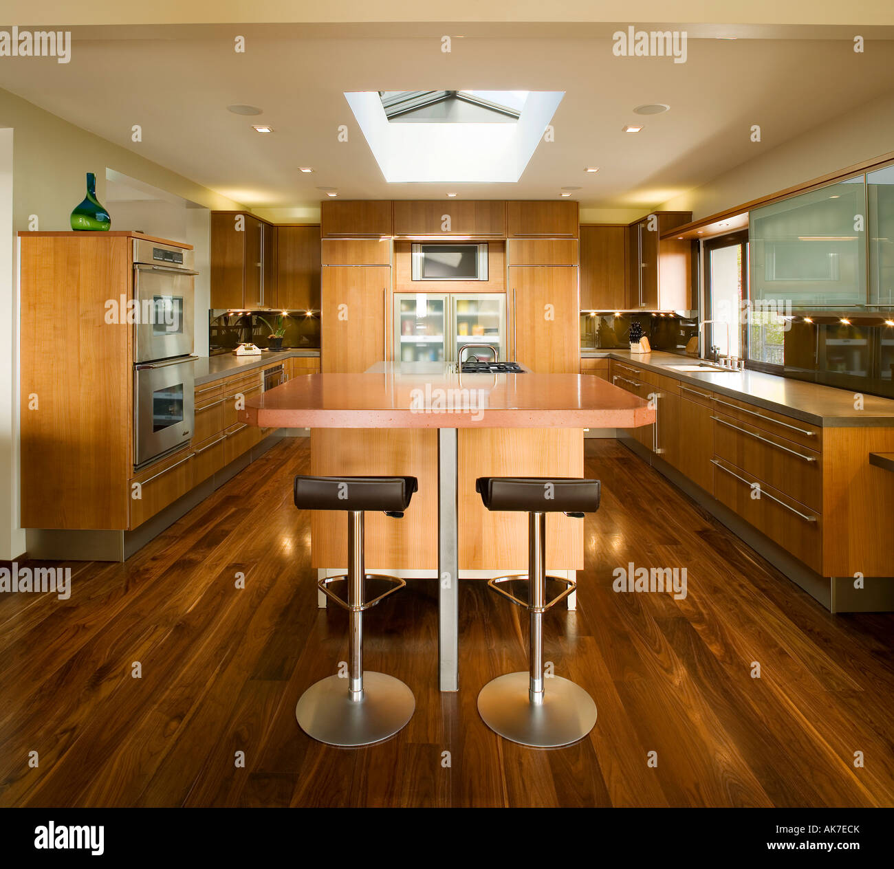 Modern Kitchen with Hardwood Floors Stock Photo - Alamy