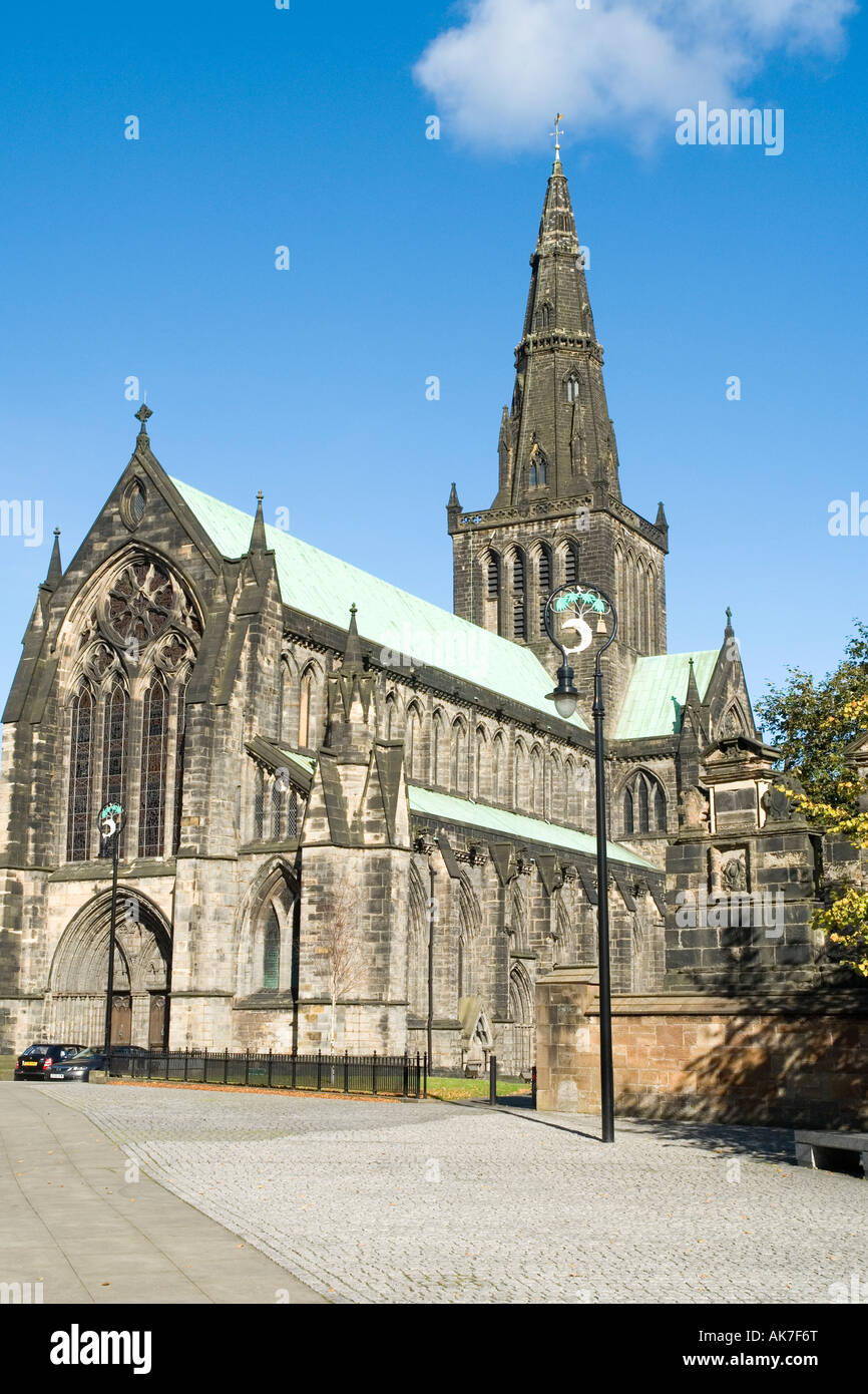 Cathedral and precincts with ornate lamp post showing old coat of arms ...